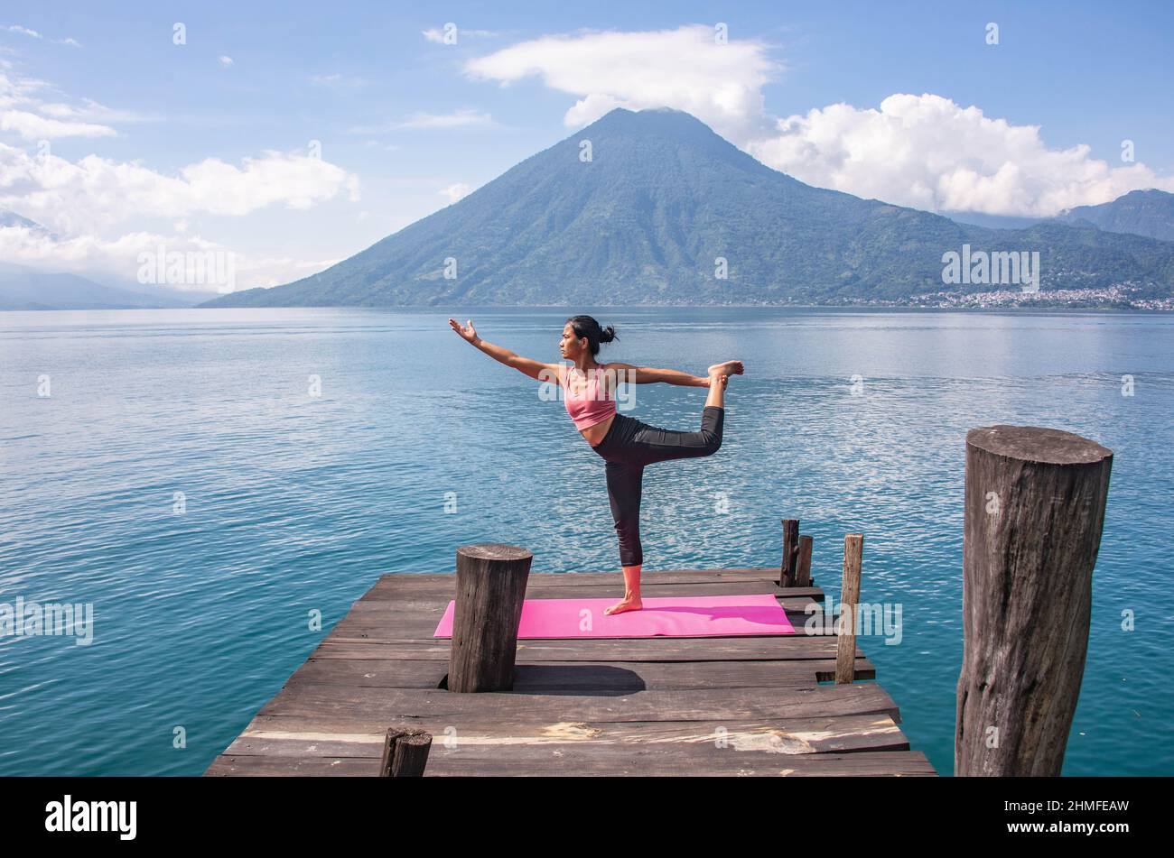 Morning yoga on the dock, San Marcos, Lake Atitlan, Guatemala Stock ...