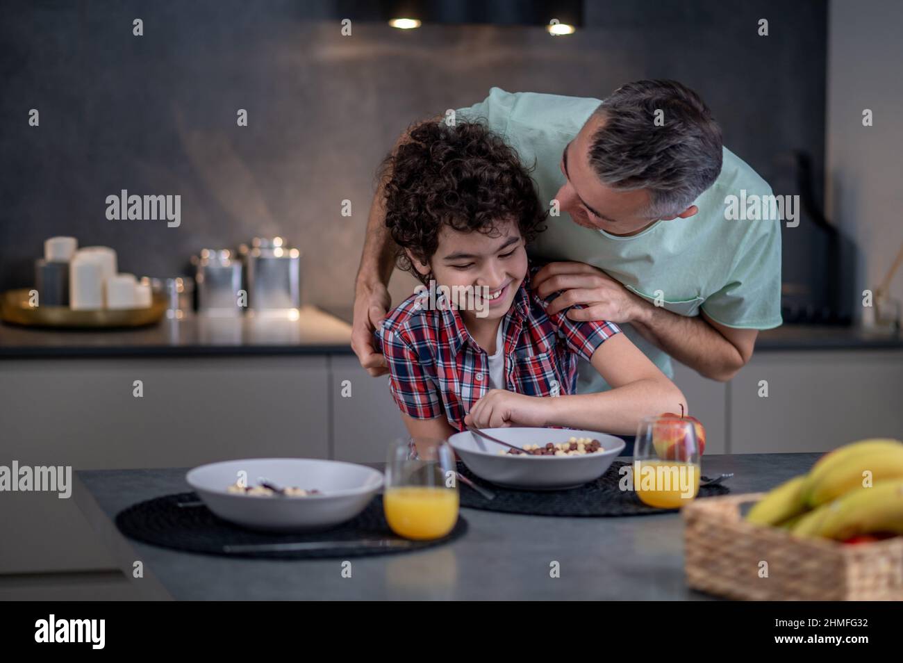 Child talking to adult elementary hi-res stock photography and images ...