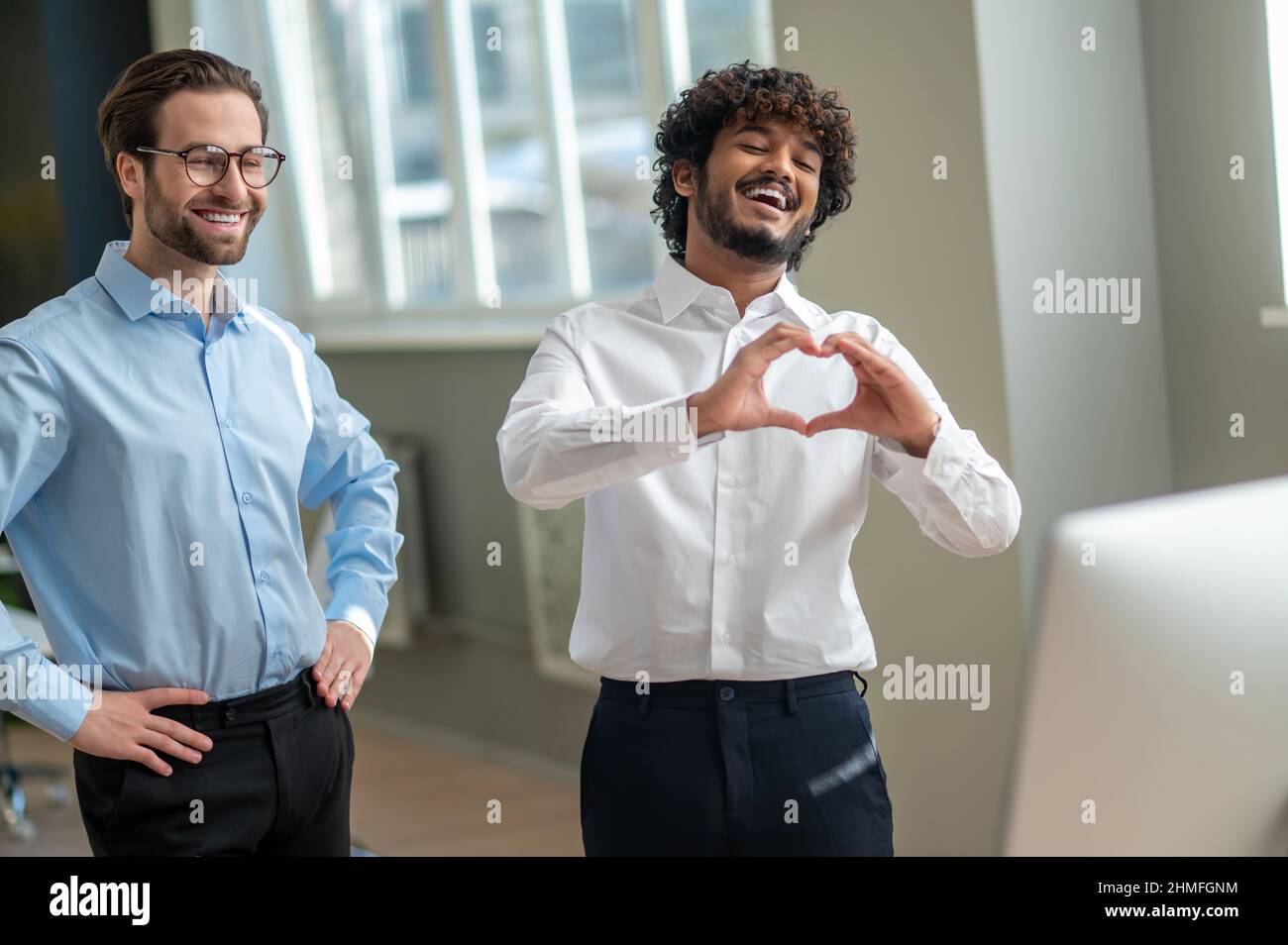 Hindu young cheerful man standing hi-res stock photography and images ...