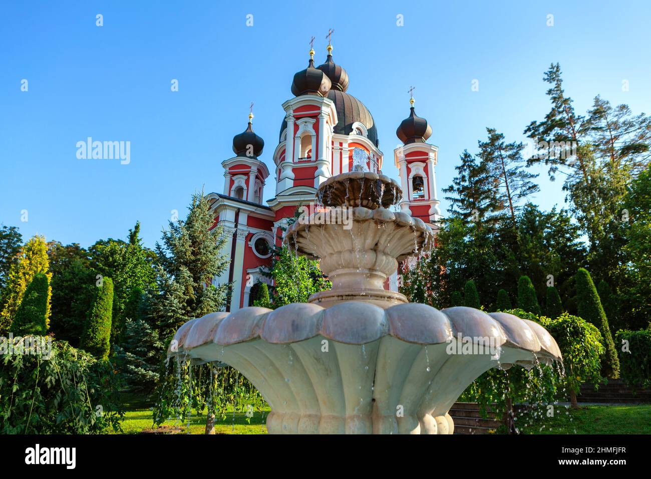 Fountain in front of the church . Famous Curchi Monastery in Moldova ...