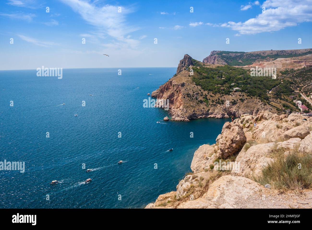 Summer view seacoast. Warm sea and beautiful nature. Sudak beach. Black ...