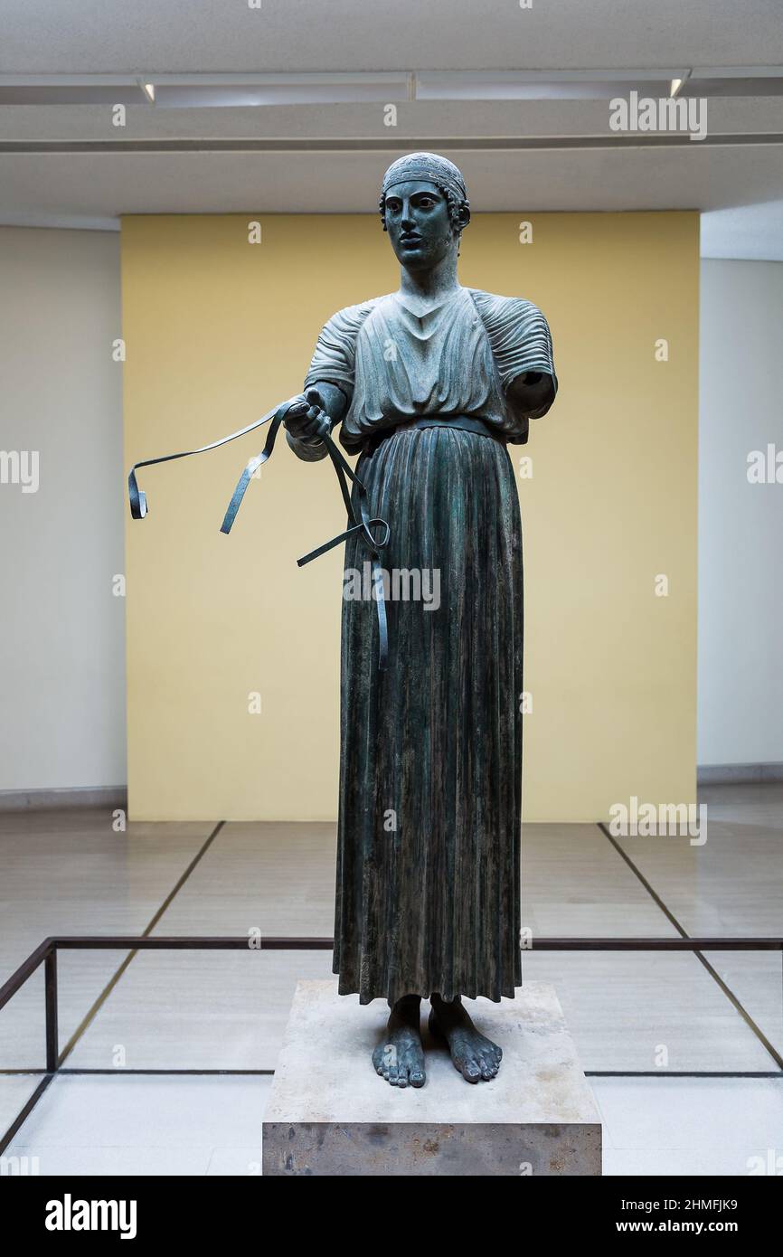 Bronze statue of a charioteer in Delphi museum in Greece Stock Photo ...
