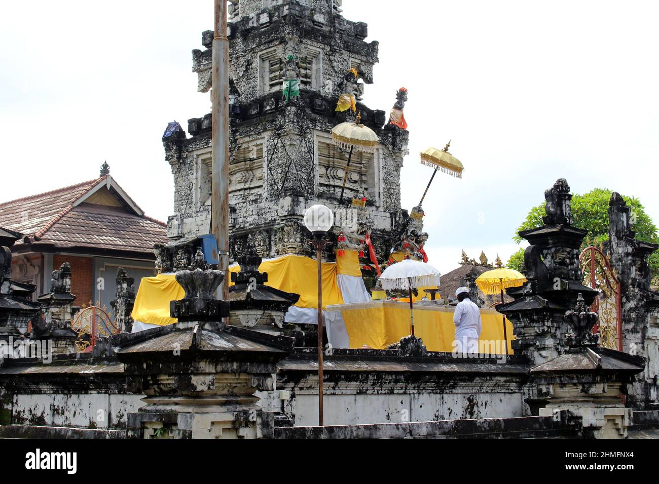 Hindu priest performing ritual at Jagatnatha Temple in Denpasar, Bali ...