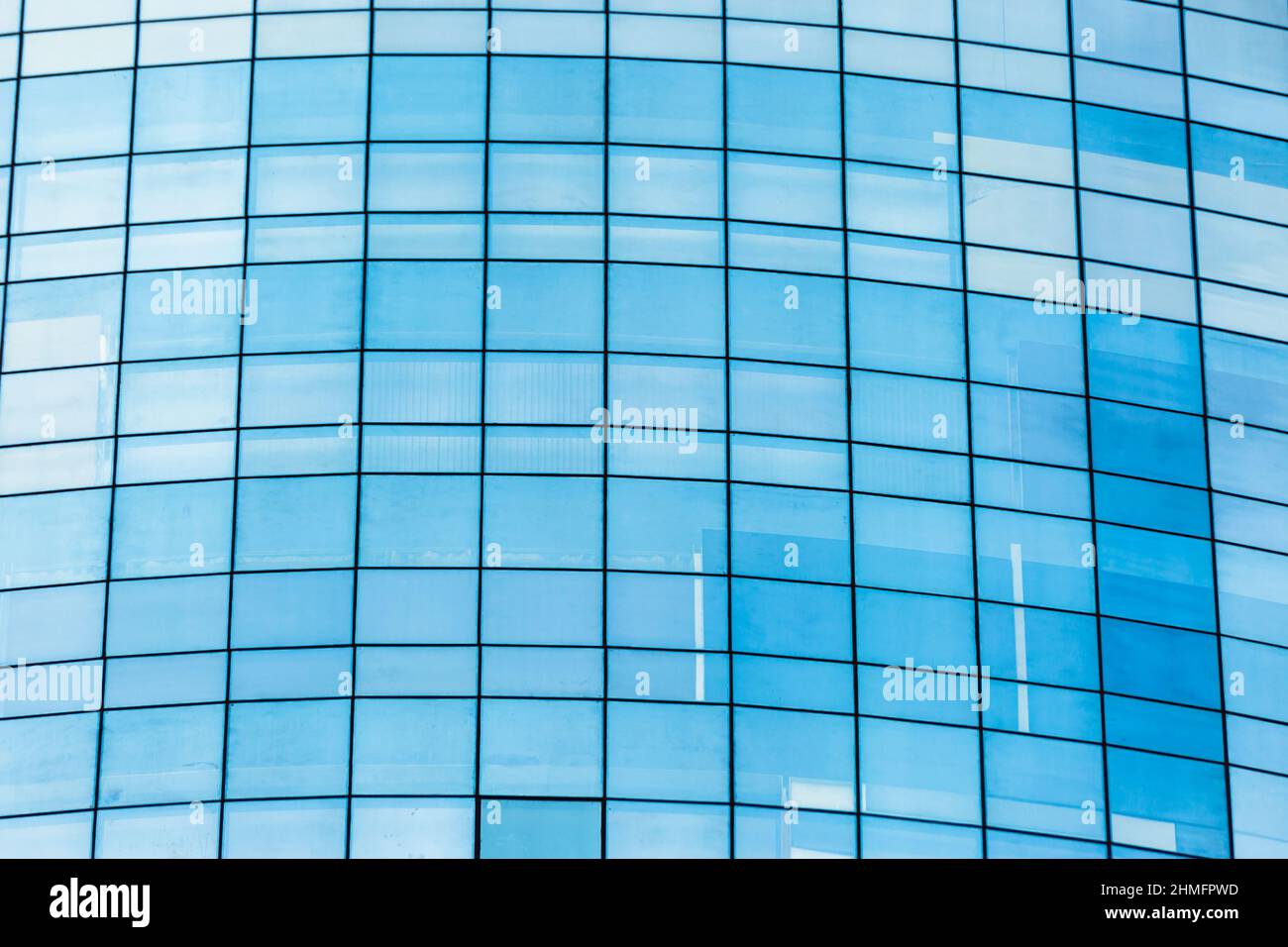 Blue glass windows of office building for background Stock Photo - Alamy