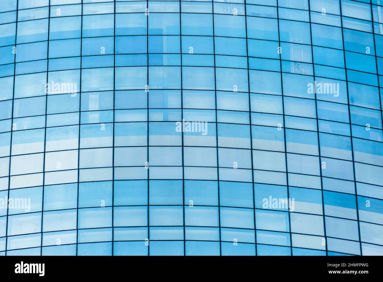 Blue glass windows of office building for background Stock Photo - Alamy