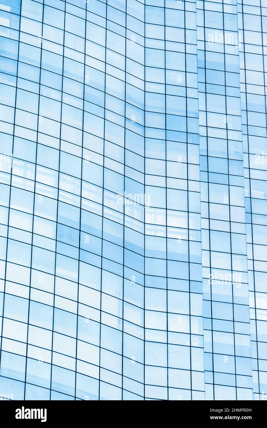 Blue glass windows of office building for background Stock Photo - Alamy
