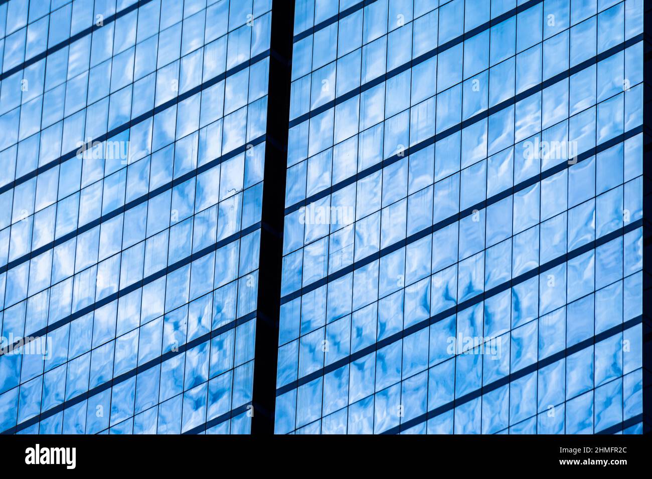 Blue glass windows of office building for background Stock Photo - Alamy
