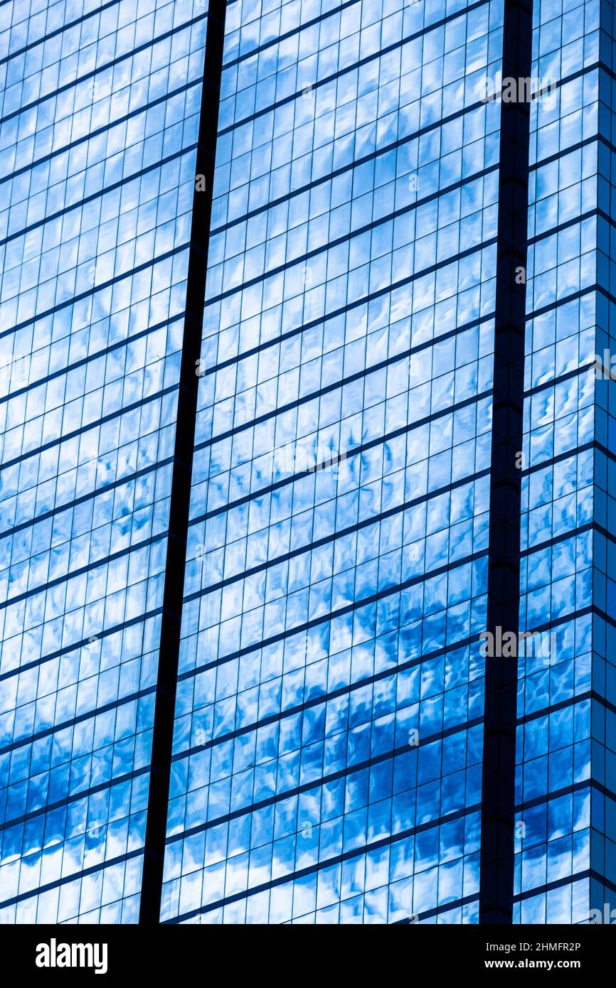 Blue glass windows of office building for background Stock Photo - Alamy