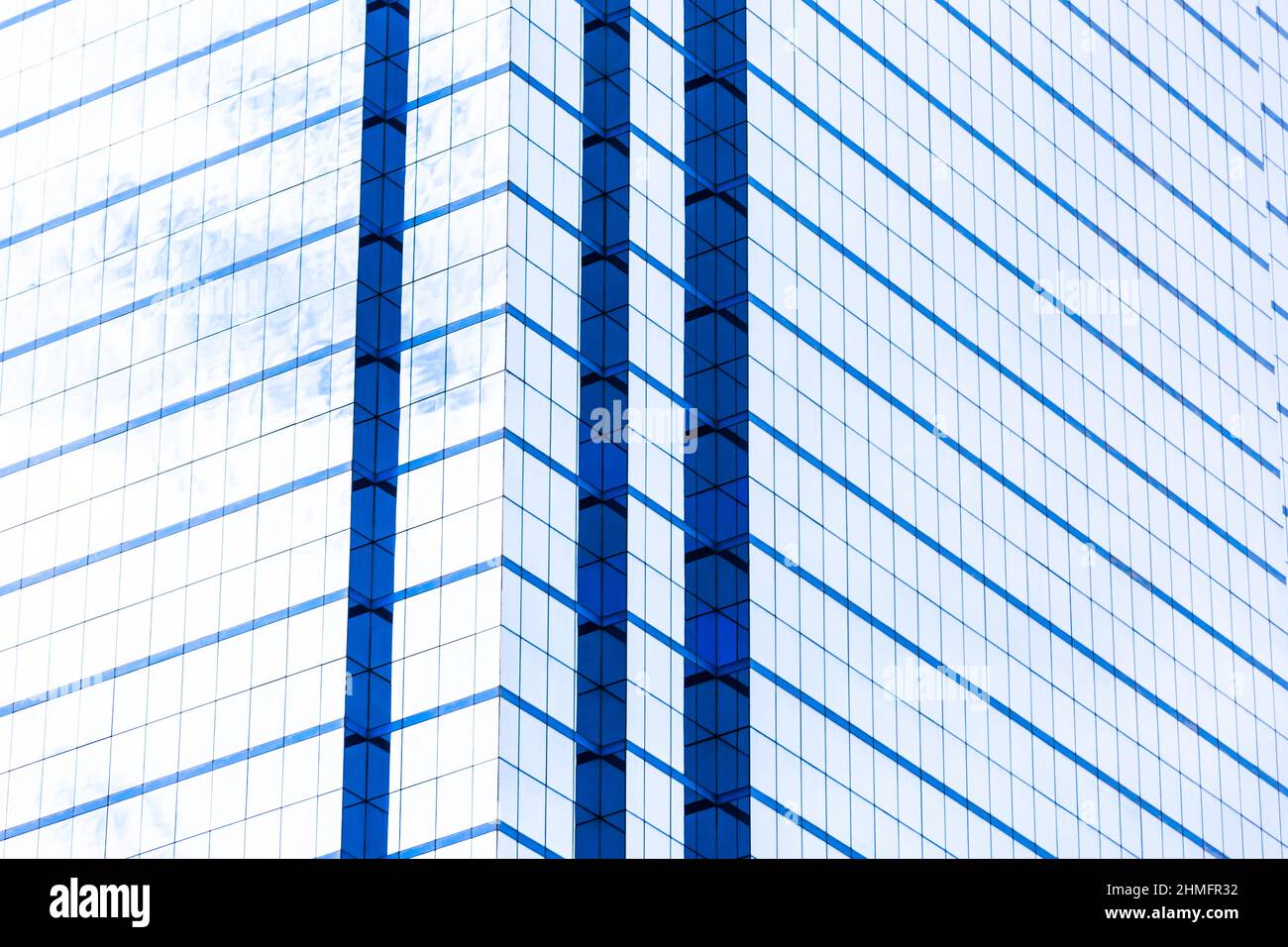Blue glass windows of office building for background Stock Photo - Alamy