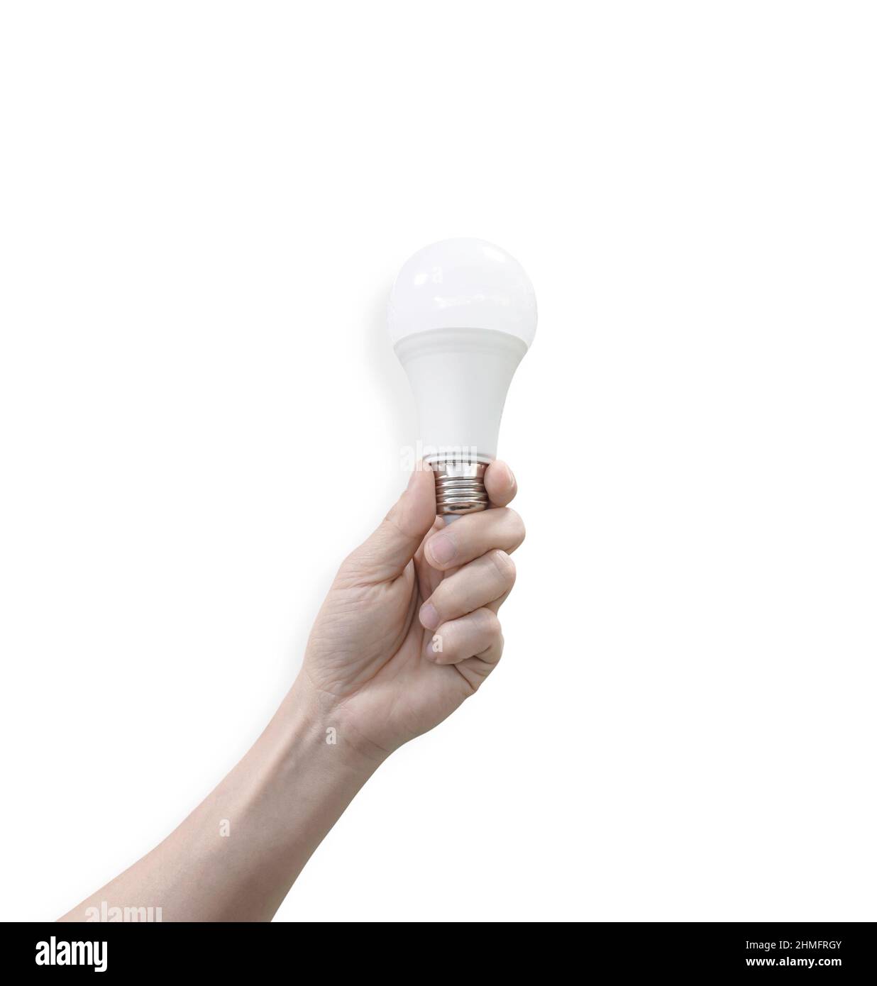 Male hand holding a LED light bulb Isolated on white background with ...