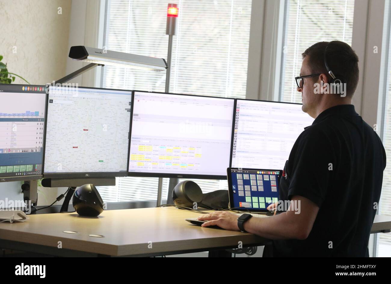 Gera, Germany. 08th Feb, 2022. A dispatcher works at the Central Rescue ...