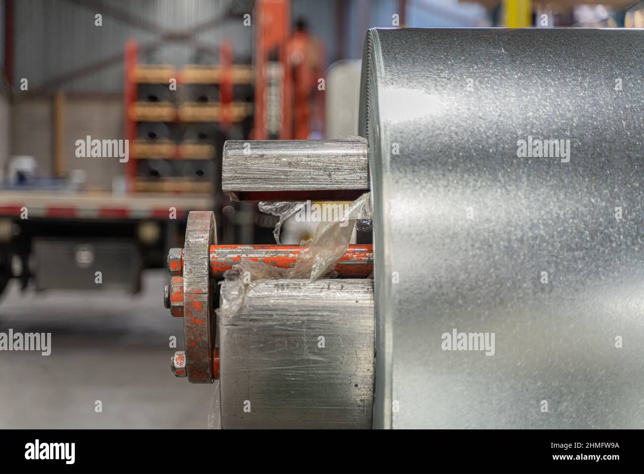 roll of silver metal steel coil in a metal roofing factory Stock Photo ...