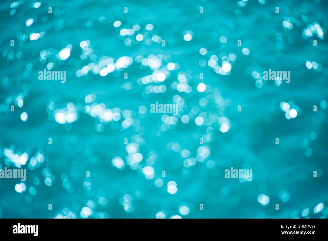 Abstract bokeh from light in the blue pool background Stock Photo - Alamy