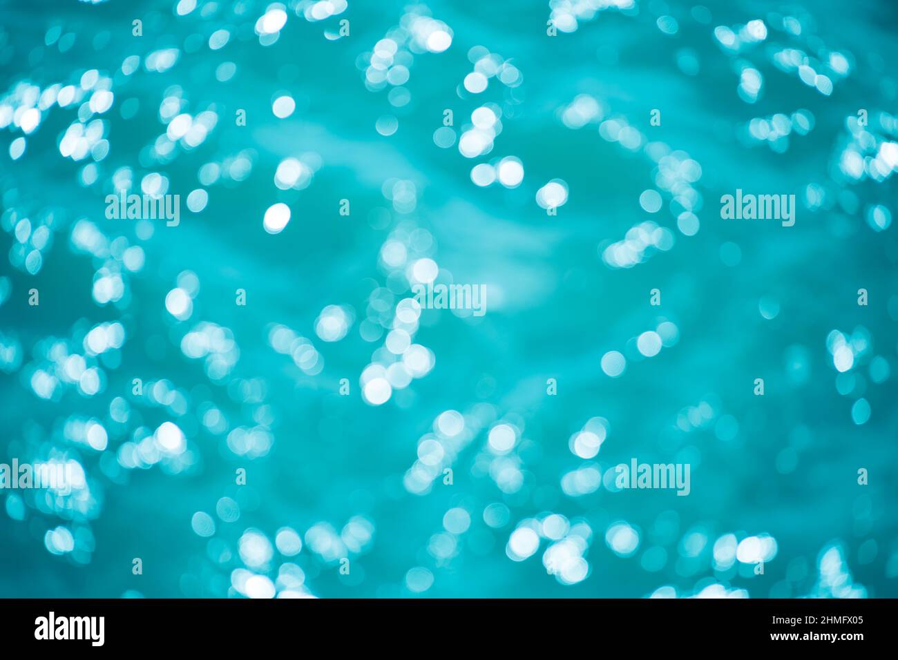 Abstract bokeh from light in the blue pool background Stock Photo - Alamy