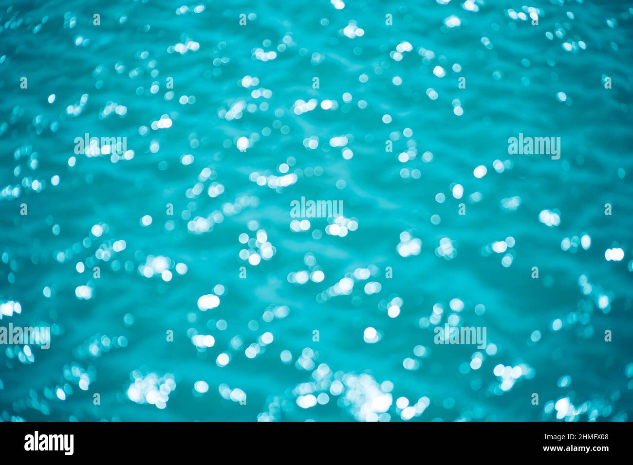 Abstract bokeh from light in the blue pool background Stock Photo - Alamy