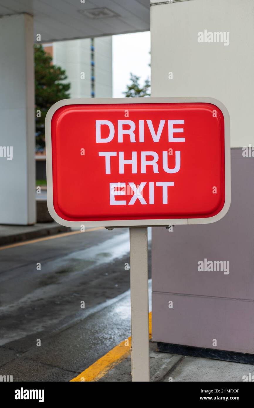 Drive Thru exit red sign near fast food restaurant or cafe Stock Photo ...