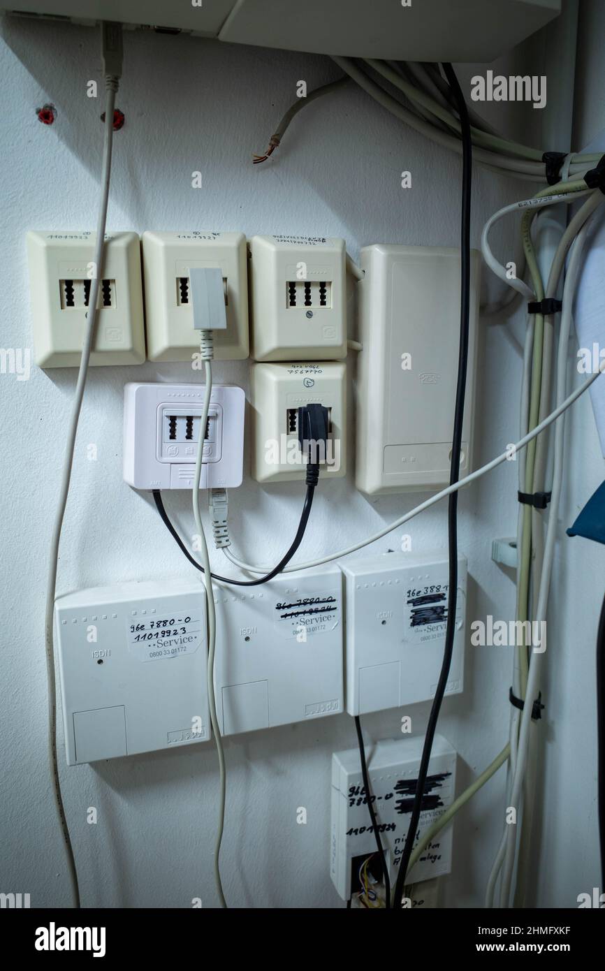 on one wall are many analog telephone connections Stock Photo - Alamy