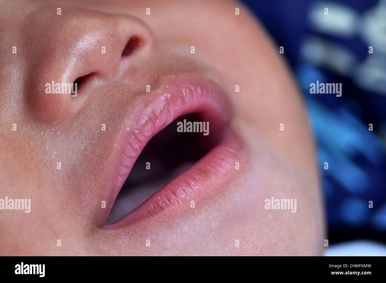 Mouth shape of asian baby boy crying Stock Photo - Alamy