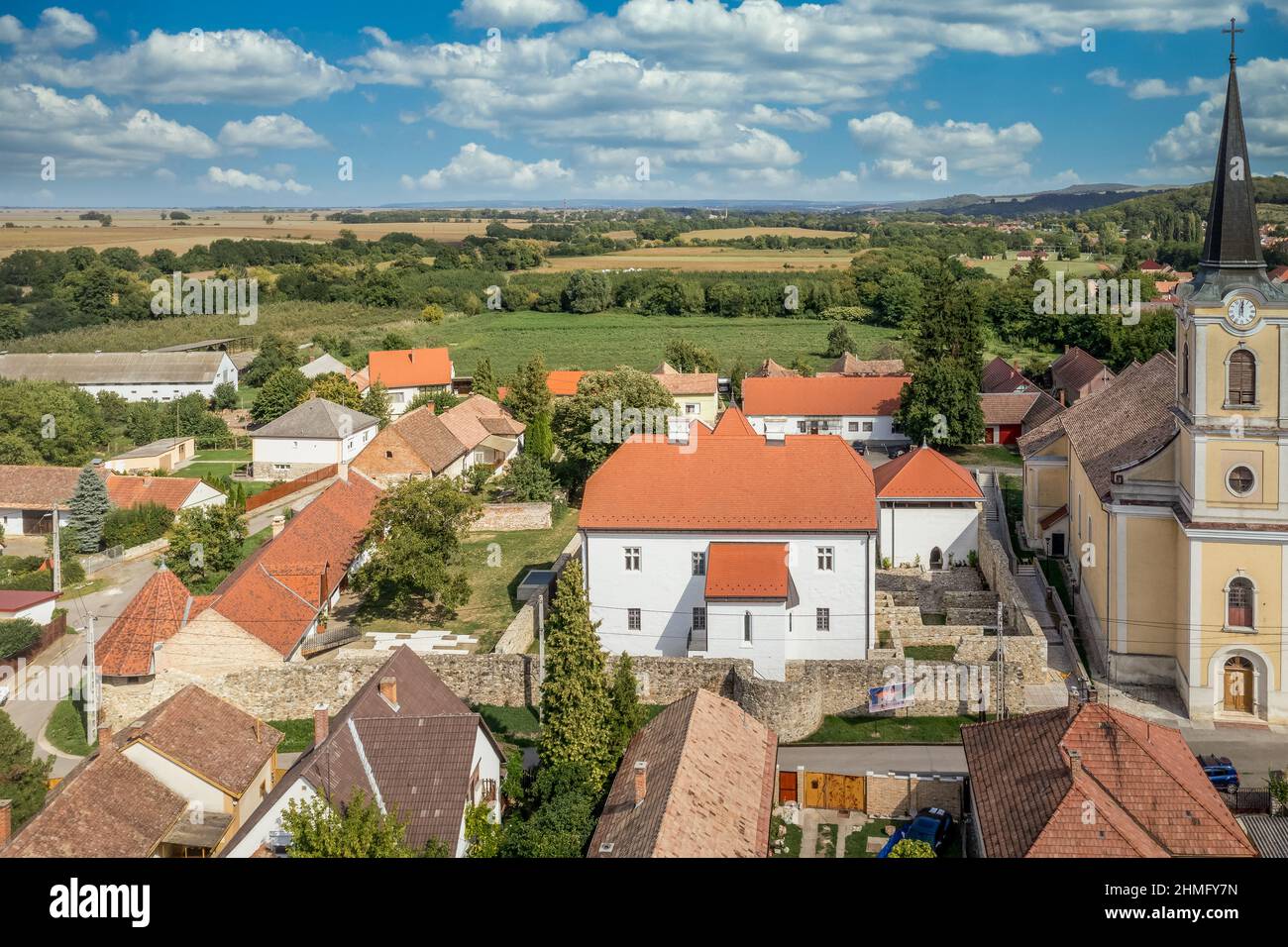 Aerial view of Szaszvar castle and fortified manor house, church in ...