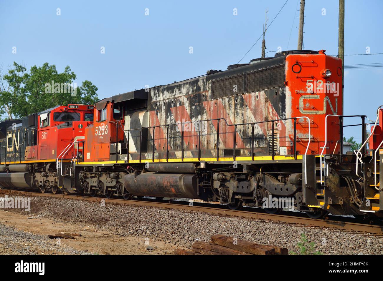 Bartlett, Illinois, USA. Canadian National Railway locomotives, including a well-worn unit built ...