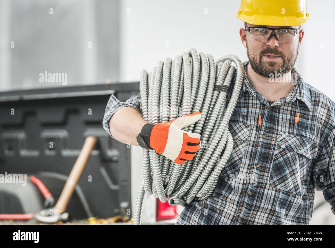 Caucasian Professional Contractor with Conduit Electric Pipe on His ...