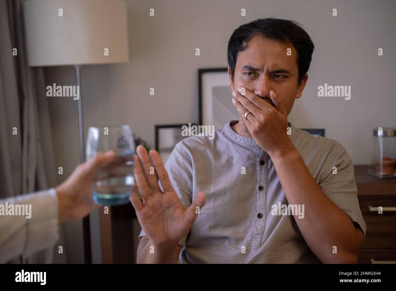 muslim man refuse the offer to drink water Stock Photo - Alamy