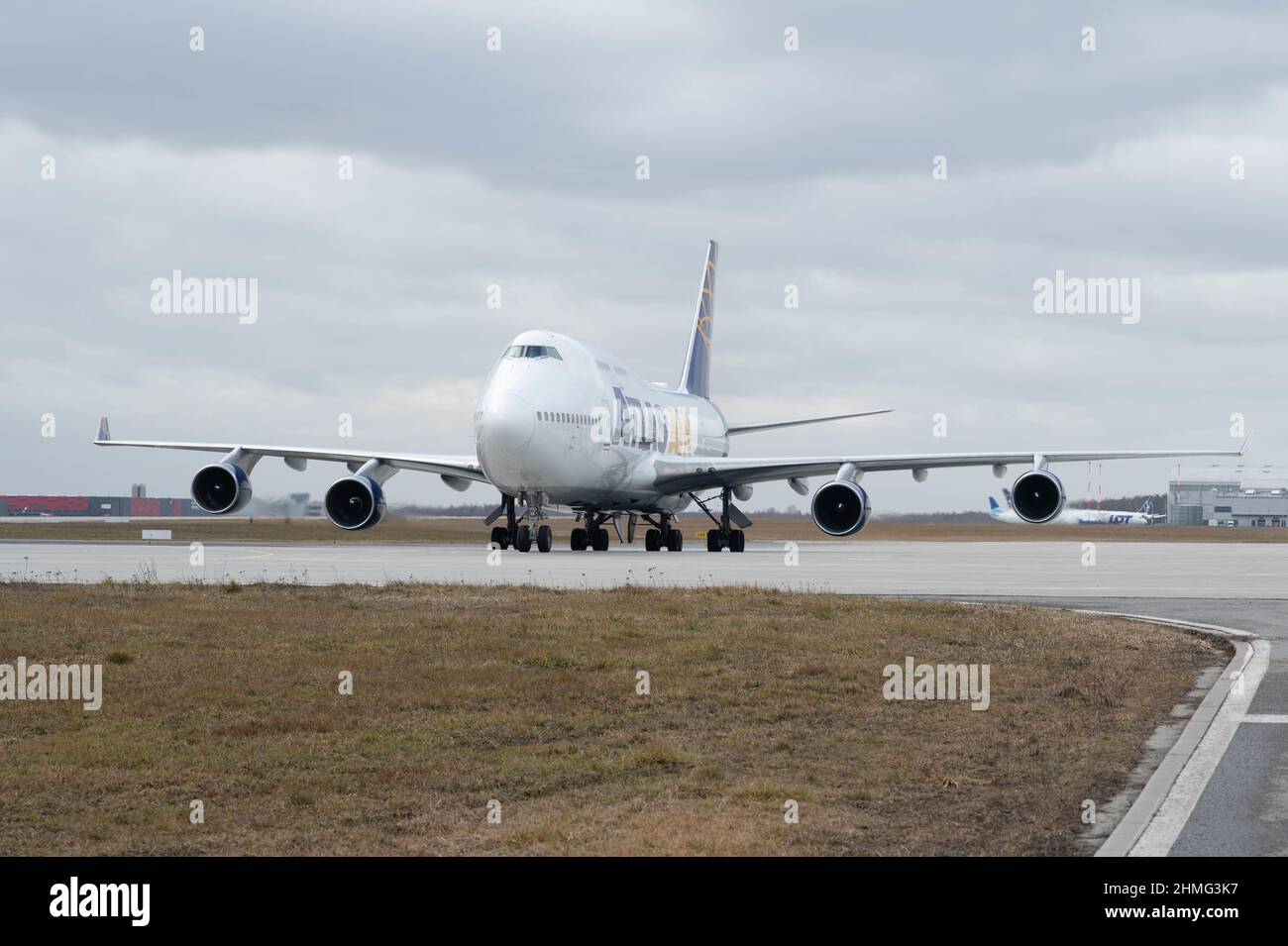A Boeing 747 aircraft is marshaled into its spot in Rzeszów-Jasionka ...