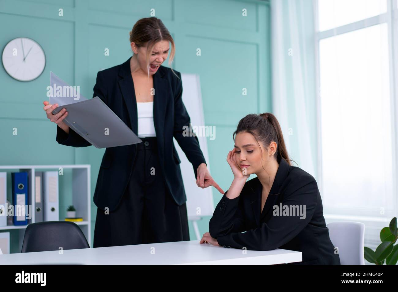 Boss screaming at frustrated employee, bullying and emotional abuse at ...