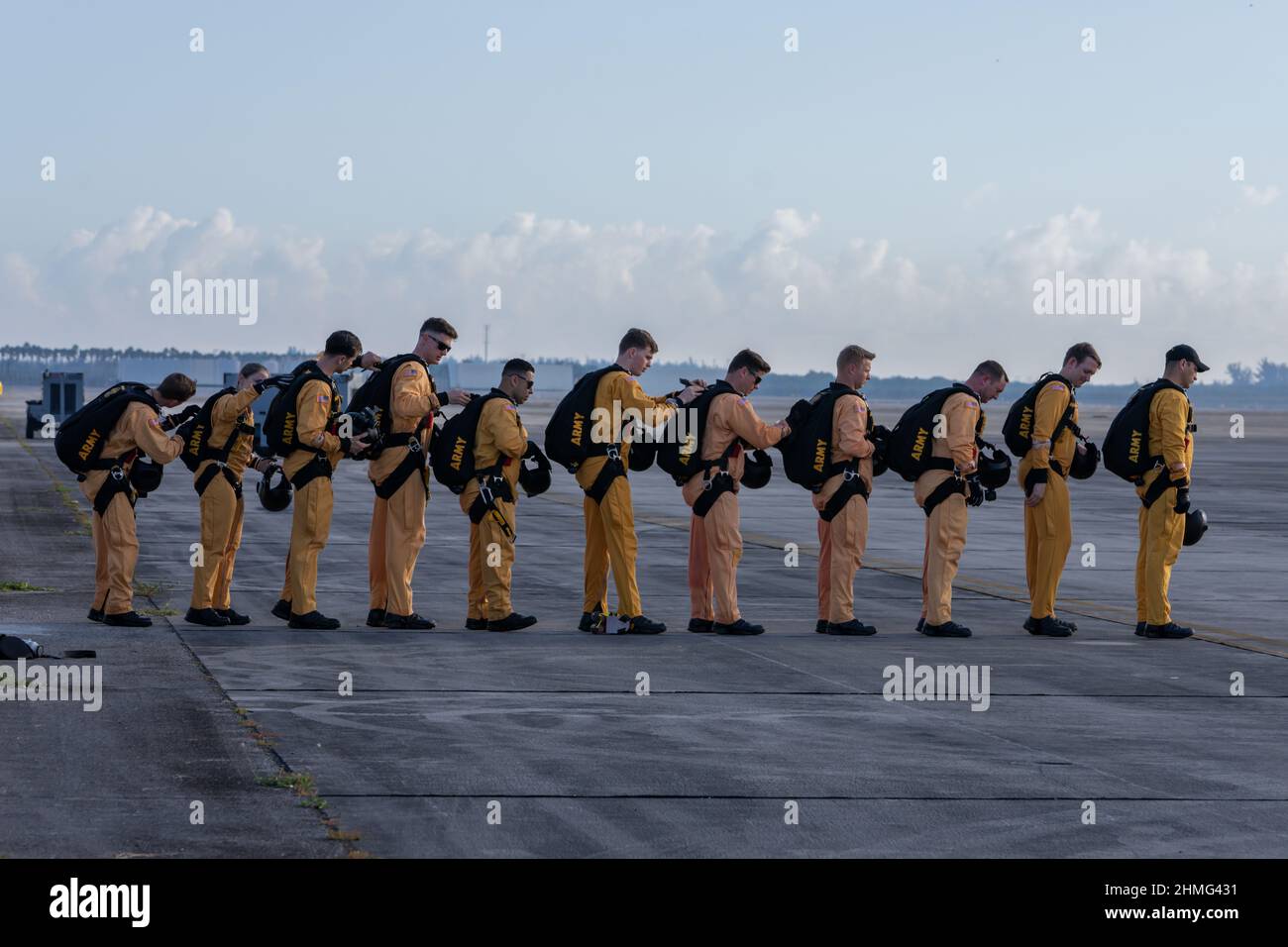 Members of the U.S. Army Parachute Team conduct gear checks prior to ...