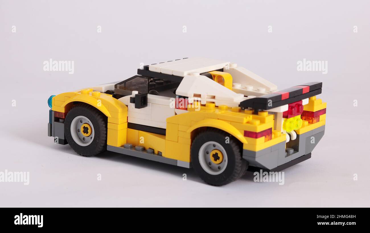 creating making sport car from brick Stock Photo - Alamy