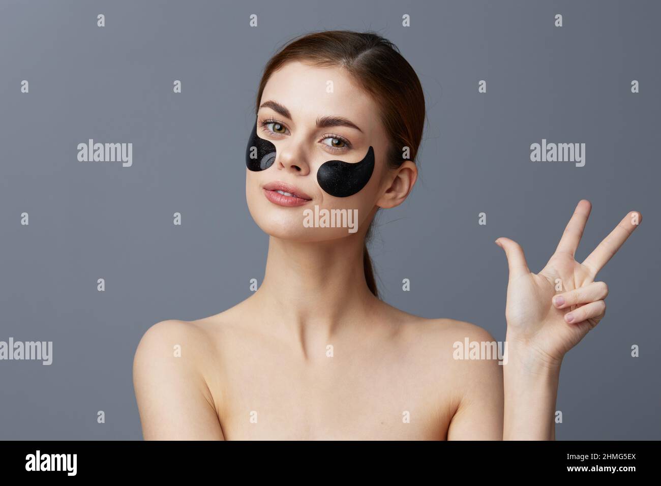 woman with patches on the face clean skin health rejuvenation close-up ...