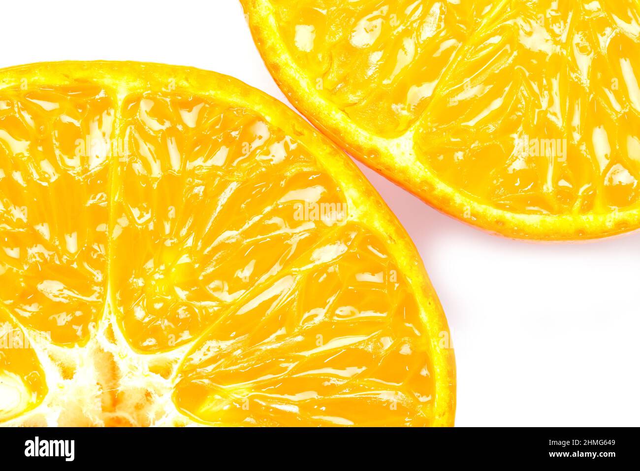 Orange slice (half) isolated on white background Stock Photo - Alamy