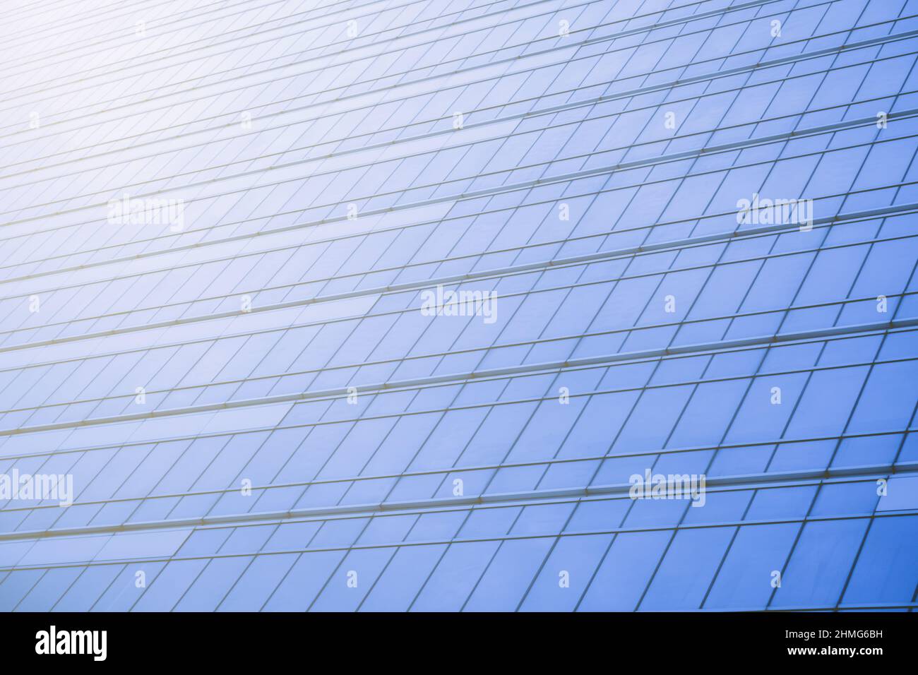 Modern office building windows use for background Stock Photo - Alamy