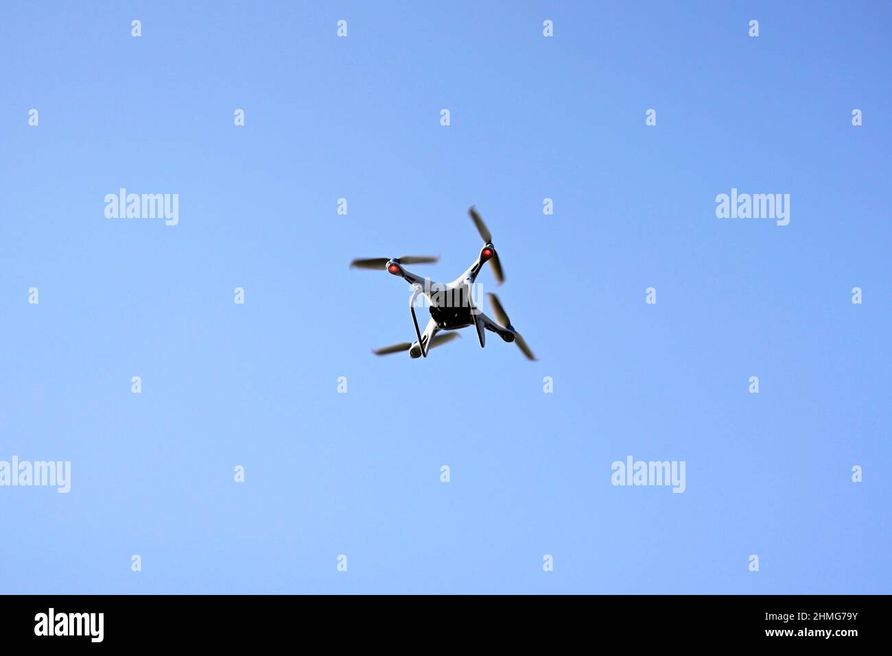 Drone hovering in air close hi-res stock photography and images - Alamy
