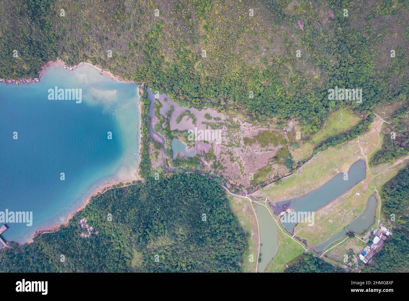 Beautiful top view aerial shot of the wetland in Shan Chung. The remote ...