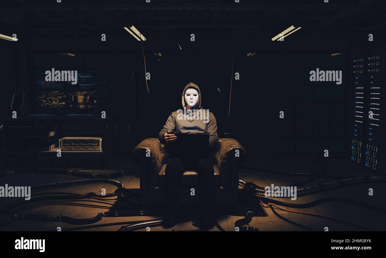 hacker with white mask sitting in an armchair with a computer Stock ...