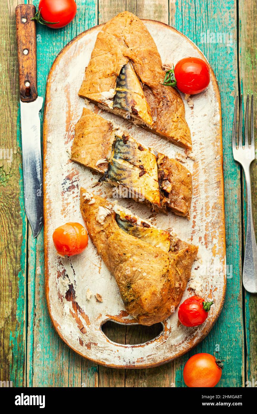 Delicious mackerel fish baked in dough Stock Photo - Alamy