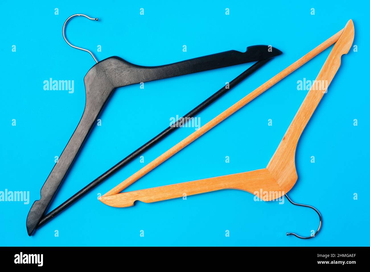 Blue hanger on trendy blue color background. Template fashion blog ...