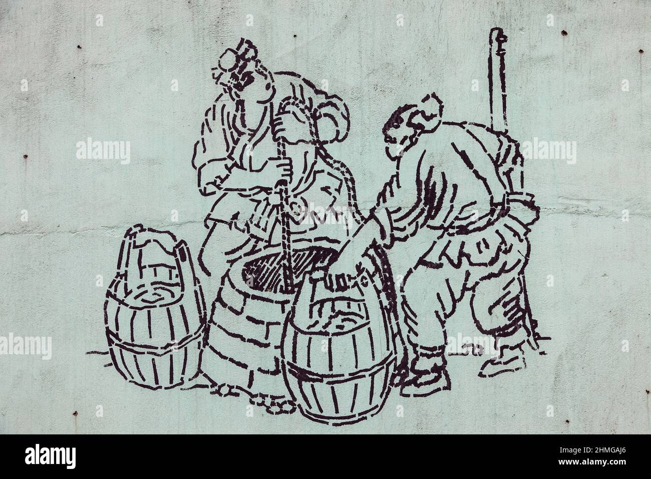 Two figures drawing water from a well hi-res stock photography and ...