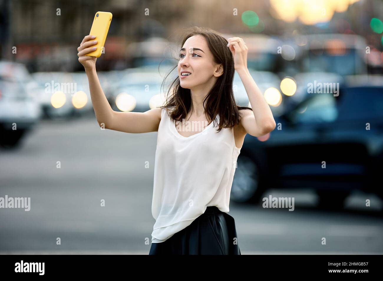 Live streaming on the street hi-res stock photography and images - Alamy