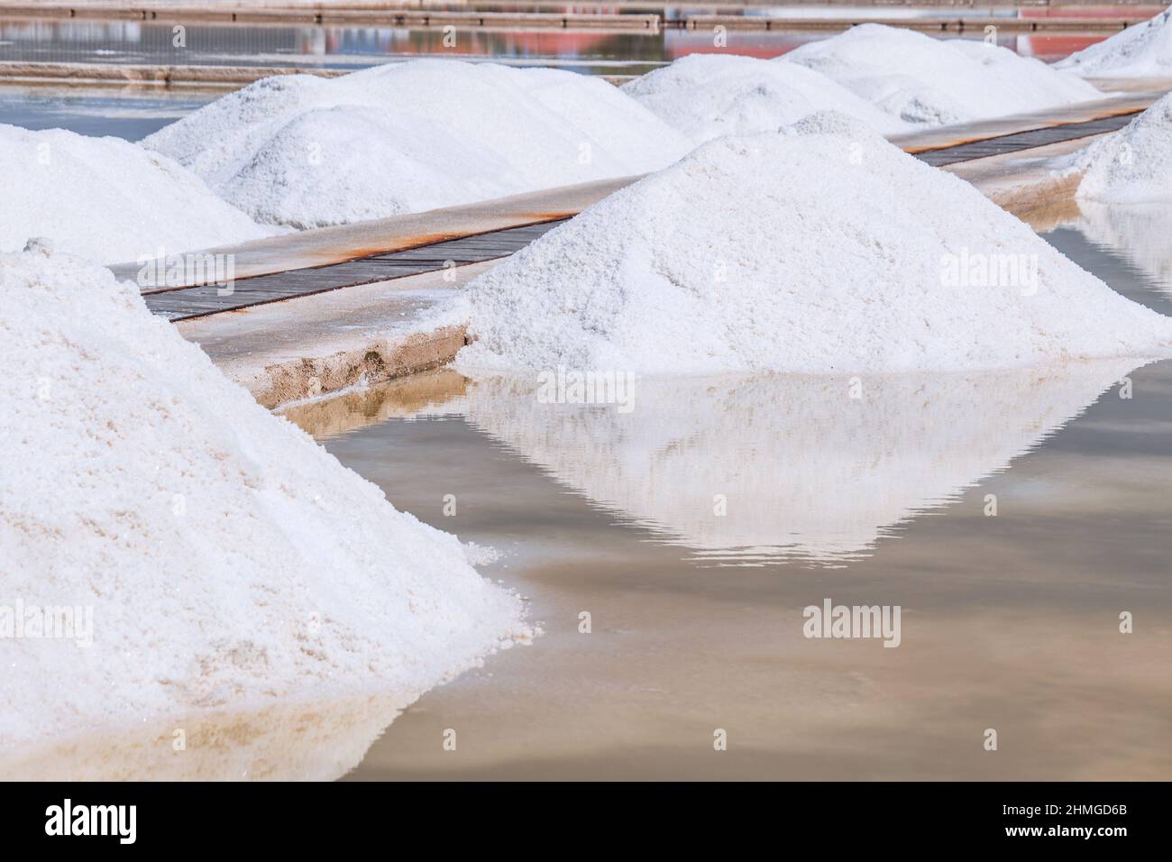 Sea salt mining, produced from the evaporation of seawater Stock Photo ...