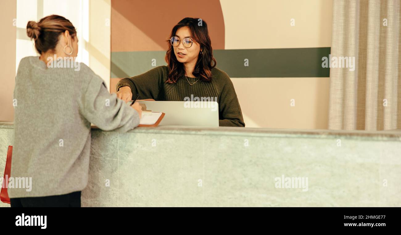 Signing a check hi-res stock photography and images - Alamy