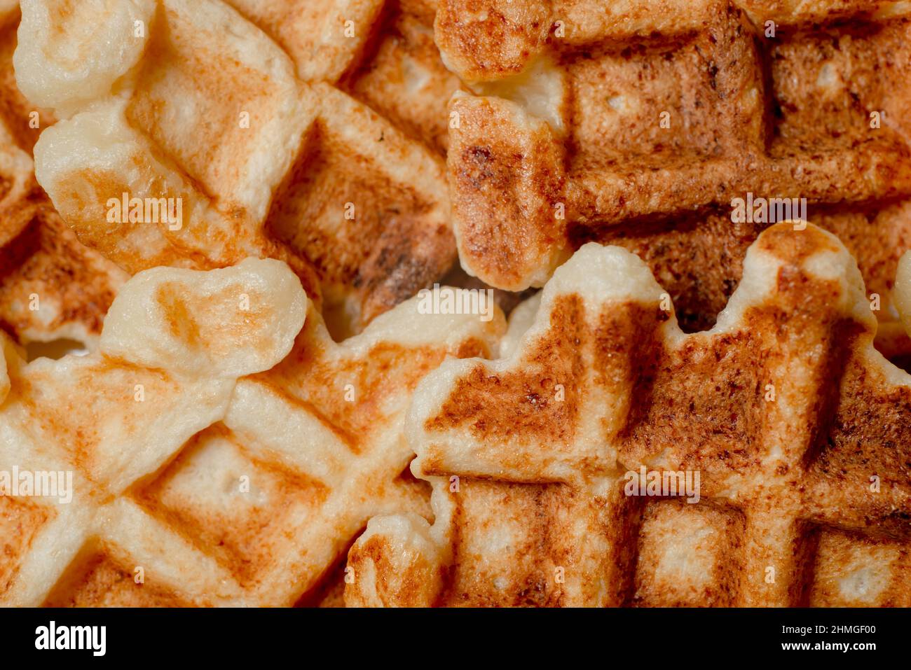 Belgian waffles close-up background. Home made Stock Photo - Alamy
