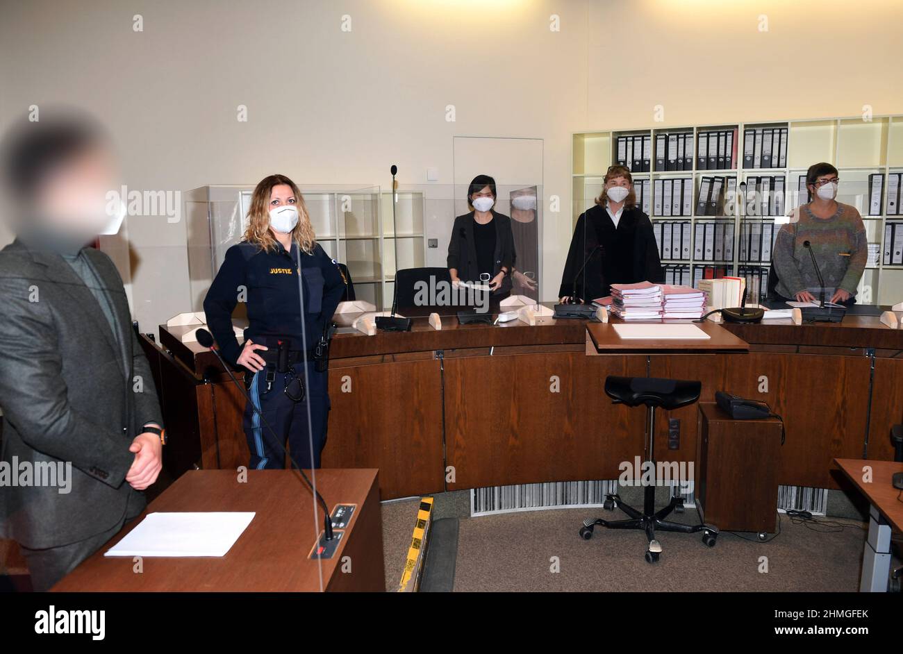 Munich, Germany. 10th Feb, 2022. The defendant (l) and Judge Ciolek ...