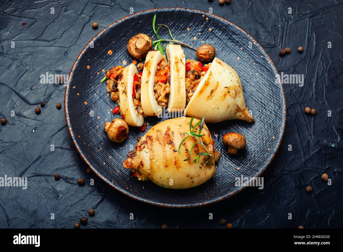 Tasty grilled squid tubes hi-res stock photography and images - Alamy