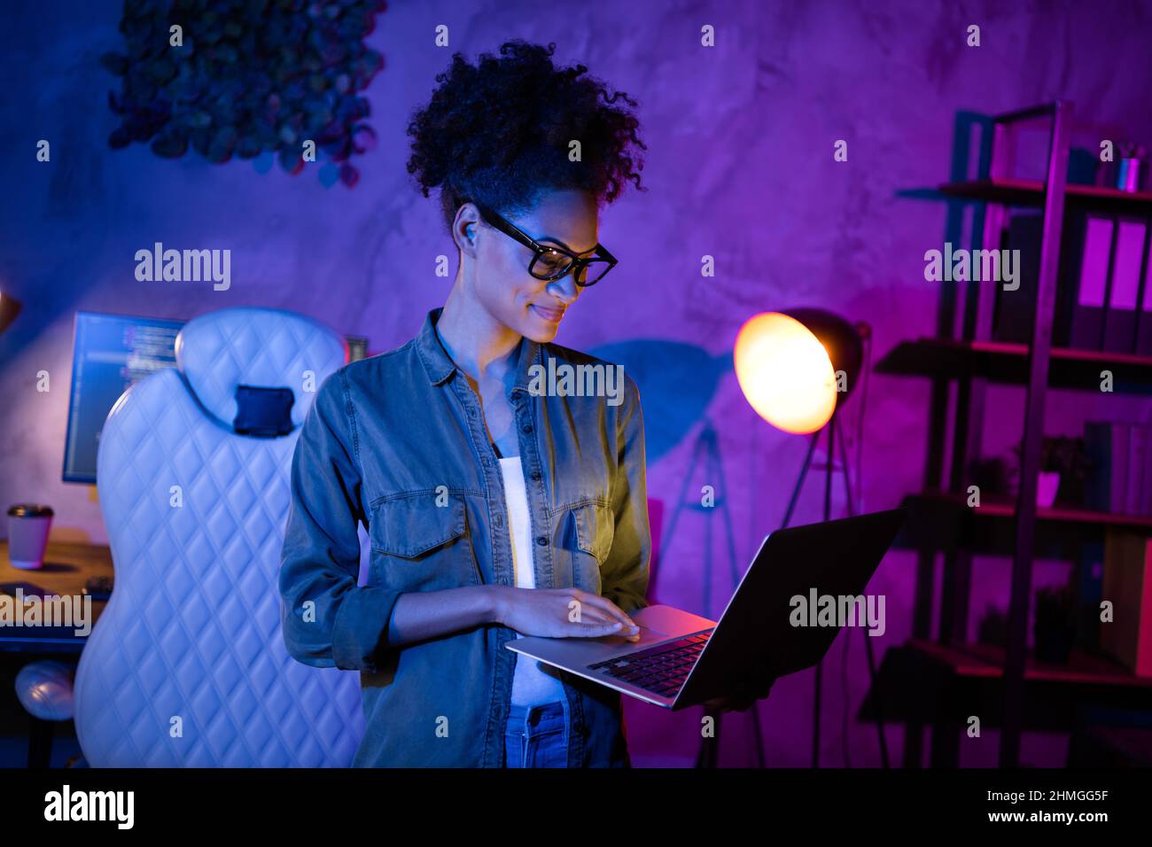 Photo of smart lady designer use gadget netbook look screen monitor ...