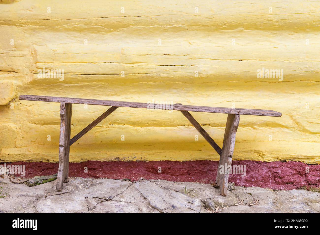 An ancient bench at the old wooden house Stock Photo - Alamy