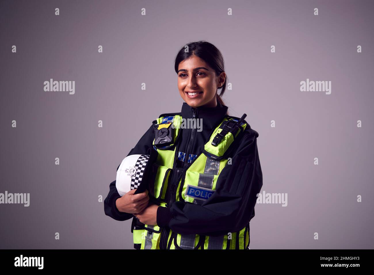 Female police officer smiling hi-res stock photography and images - Alamy
