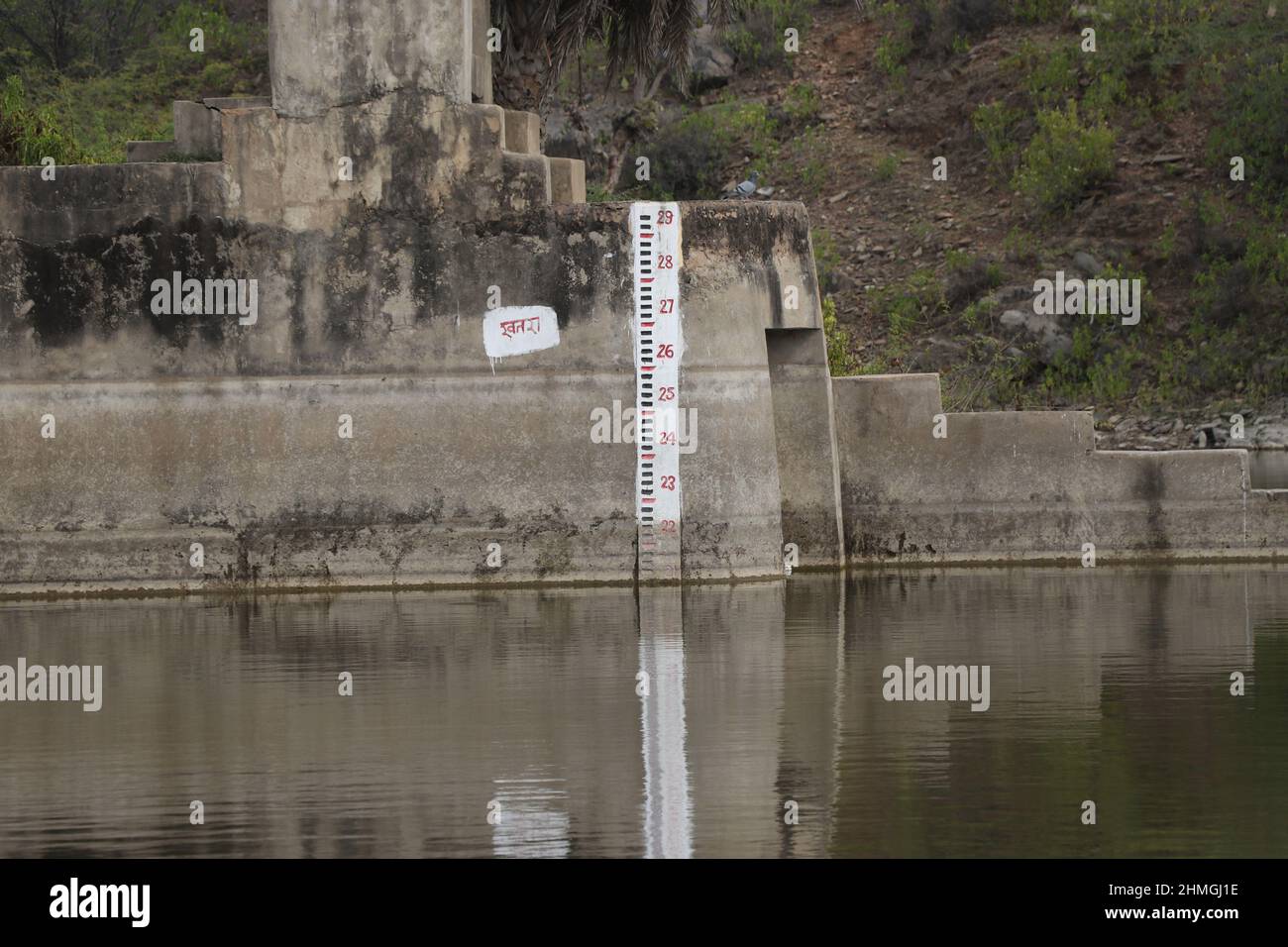 water level scale on dame wall Stock Photo - Alamy