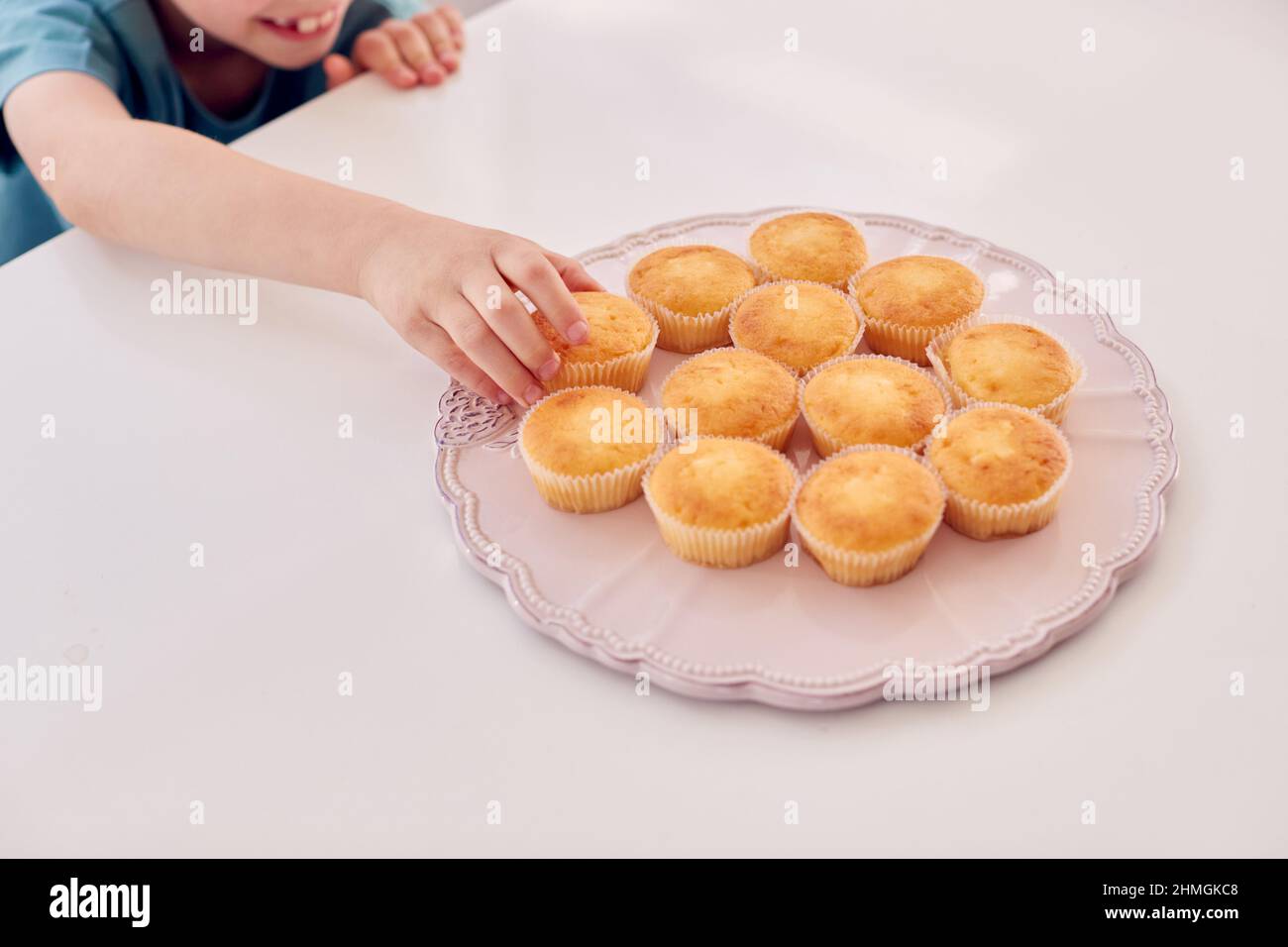 Hand reaching cake hi-res stock photography and images - Alamy